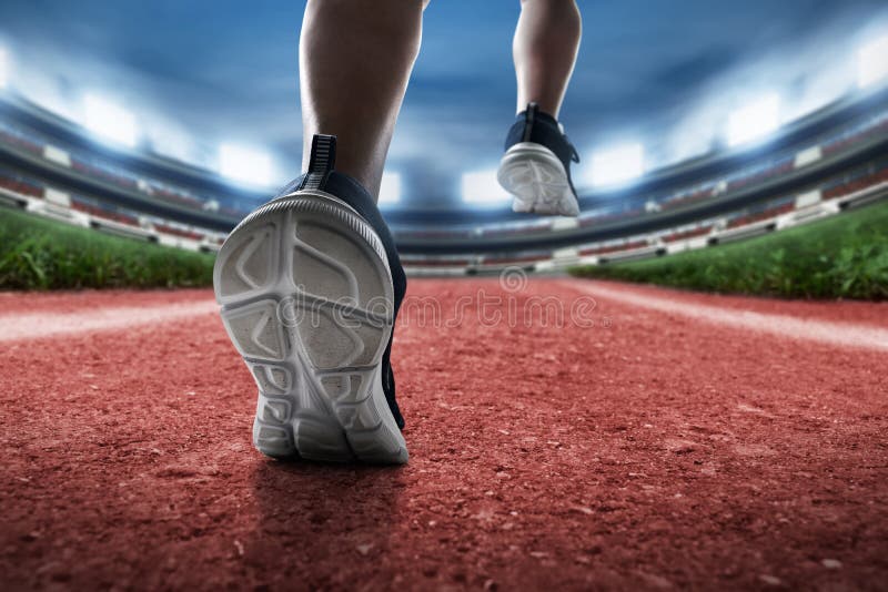 Man running on the track stock photo. Image of race - 138514890