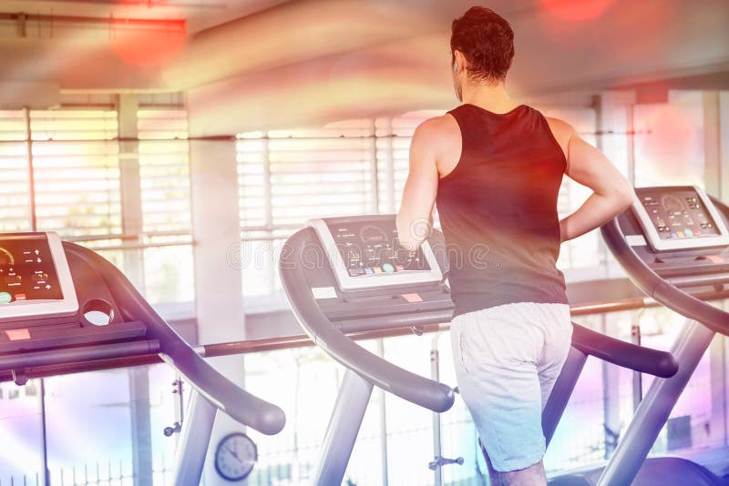 Man running on treadmill stock photo. Image of computer - 84433758