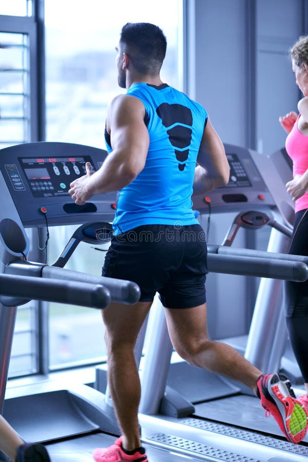 Man Running on Treadmill in Gym Stock Image - Image of male, power: 7419057