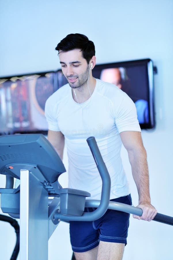 Man Running on the Treadmill Stock Photo - Image of trainer, adult ...