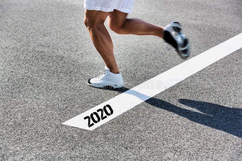 Man Running on White Line with Year 2020 Sign Stock Photo - Image of ...