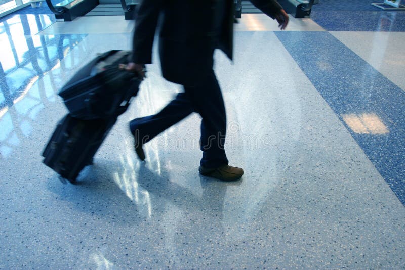 Man Rushing To Catch His Flight Stock Photo - Image of roll, baggage ...