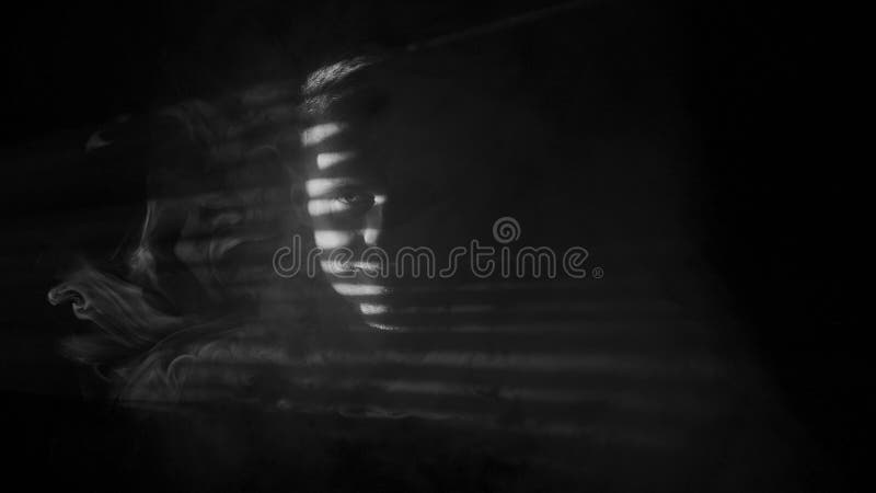 Mysterious Portrait of Man with Light and Shadow on Face Stock Photo ...