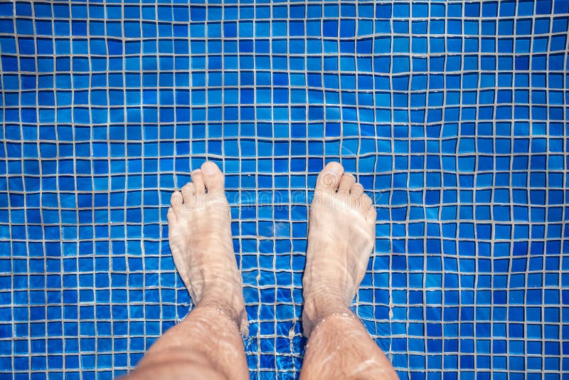 Man s Feet at Pool stock image. Image of swimming, barefoot - 53826217