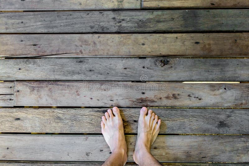 Man`s Feet on Old Plank Wood Stock Photo - Image of mans, backdrop ...