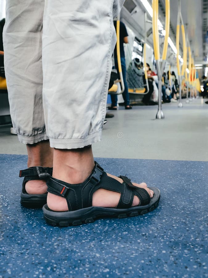 Man& X27;s Feet Standing on a Subway of a Train Stock Photo - Image of ...