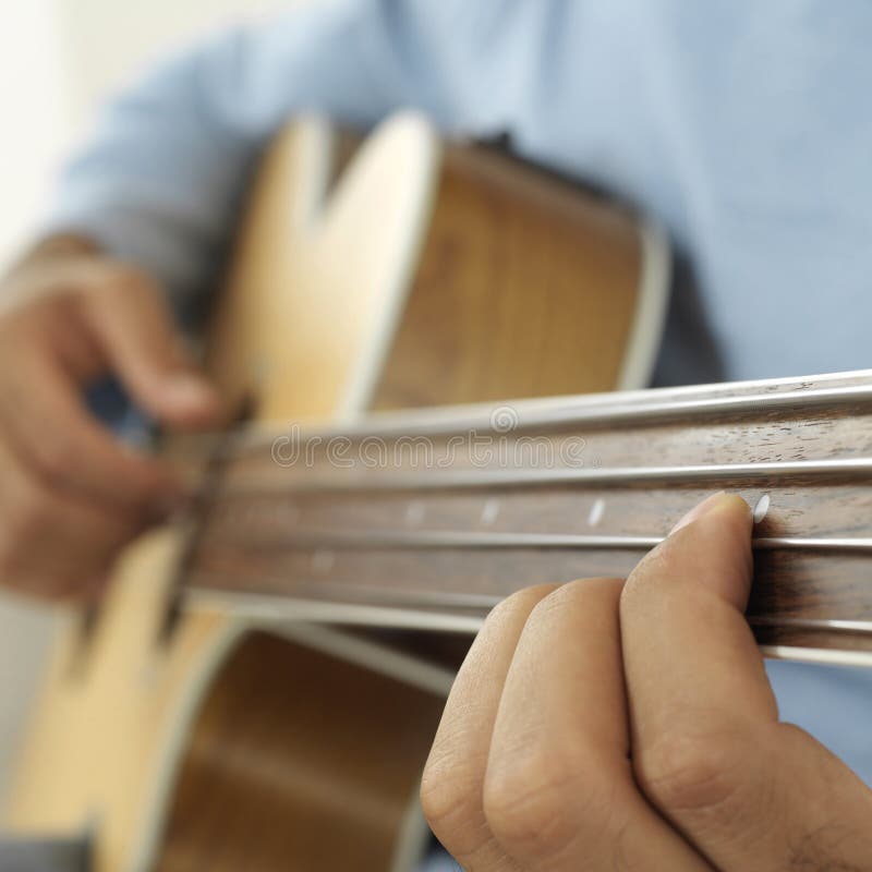 Man& X27;s Fingers Plucking Guitar. Conceptual Image Stock Photo ...