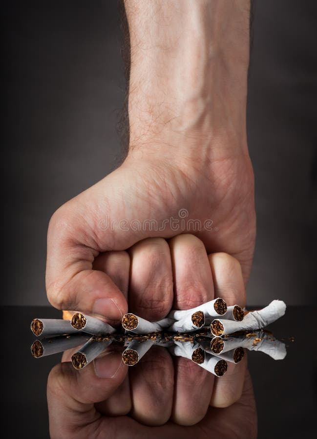 Man's Hand Crushing Cigarettes Stock Photo - Image of crush, quit: 21399250
