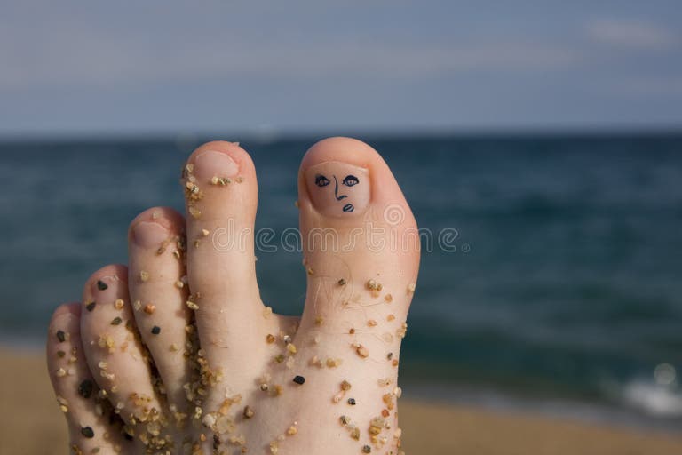 Man S Foot with Painted Face on a Toe Stock Image - Image of face, nail ...