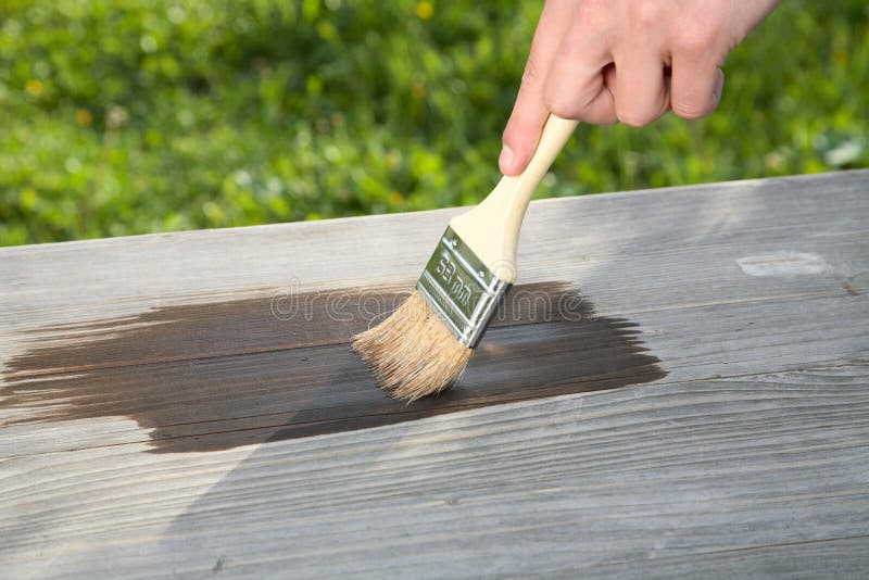 Man S Hand with Brush Paints a Board Stock Image - Image of board ...