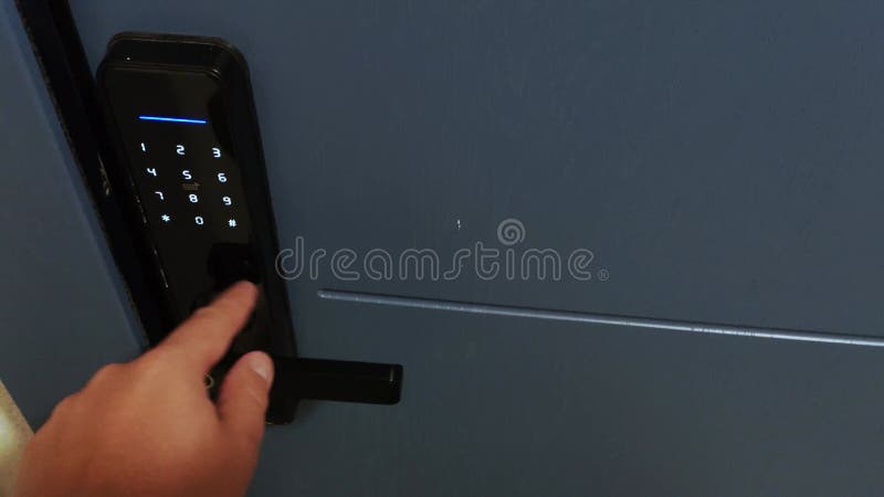A Man S Hand Dials the Code of a Modern Electronic Door Lock, Close-up ...