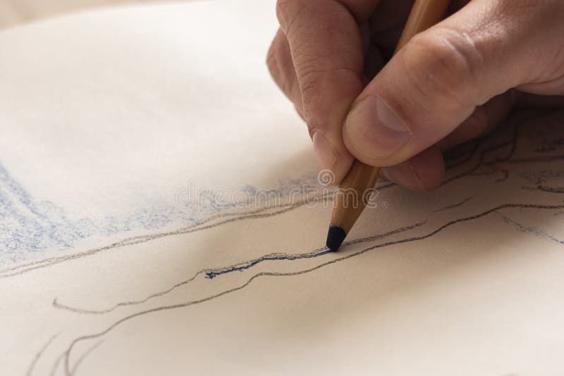 Man`s Hand Learning How To Draw with Blue Chalk Stock Photo - Image of ...