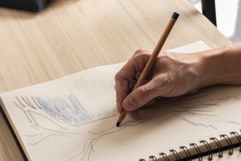 Man`s Hand Drawing with a Colored Pencil Stock Image - Image of artist ...
