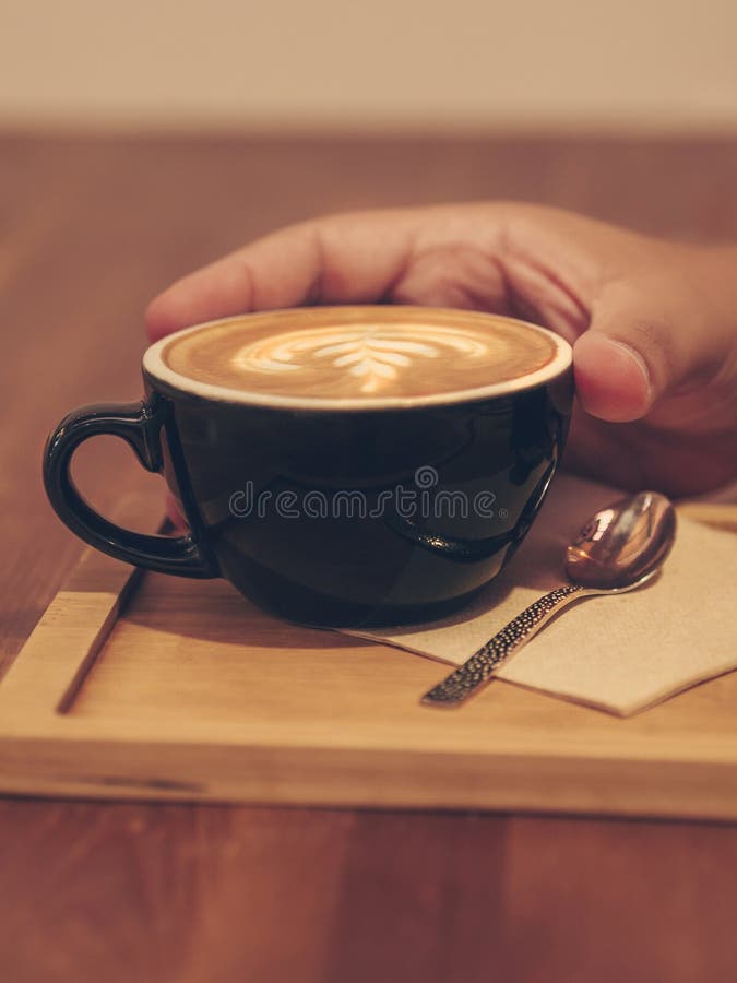 Man`s Hand Drinking a Cup of Coffee Stock Photo - Image of holding ...