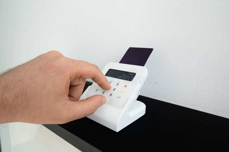 Man S Hand Entering a PIN Code on Payment Terminal Stock Photo - Image ...