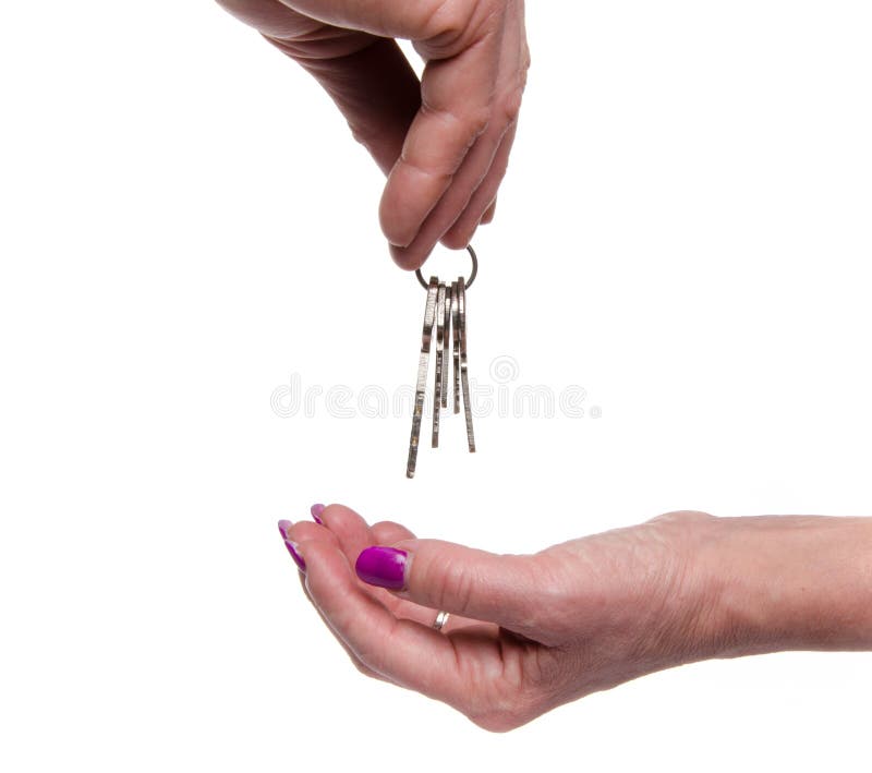 Man s hand giving keys stock photo. Image of realtor - 40860666