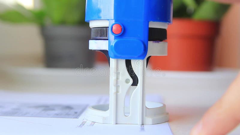 Man S Hand with the Help of a Seal Puts a Seal Under the Text Stock ...