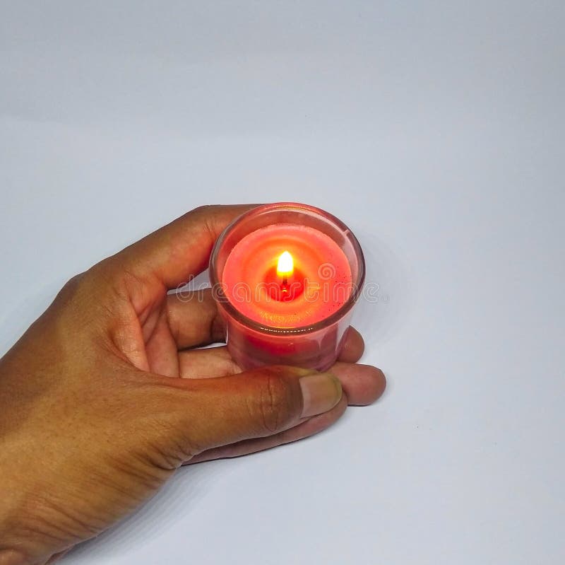 A Man& X27;s Hand Holding a Burning Red Candle Stock Image - Image of ... A Man& X27;s Hand Holding a Burning Red Candle Stock Image - Image of ...