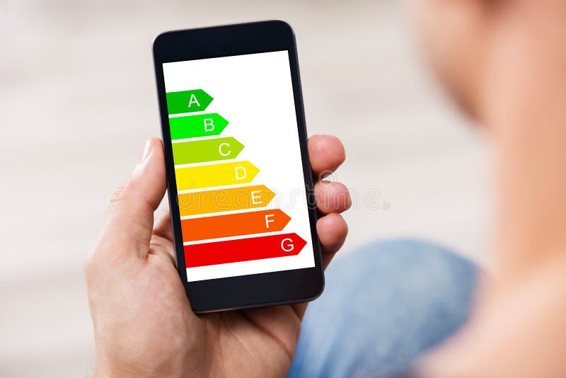 Man Holding Cellphone with Energy Efficiency Chart on Screen Stock ...