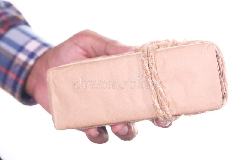 Mans Hand Holding a Gift Box Isolated on White Stock Photo - Image of ...