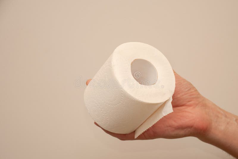 Man`s Hand Holding and Giving Toilet Paper Roll Stock Photo - Image of ...
