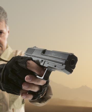 3,601 Arm Holding Gun Stock Photos - Free & Royalty-Free Stock Photos ...