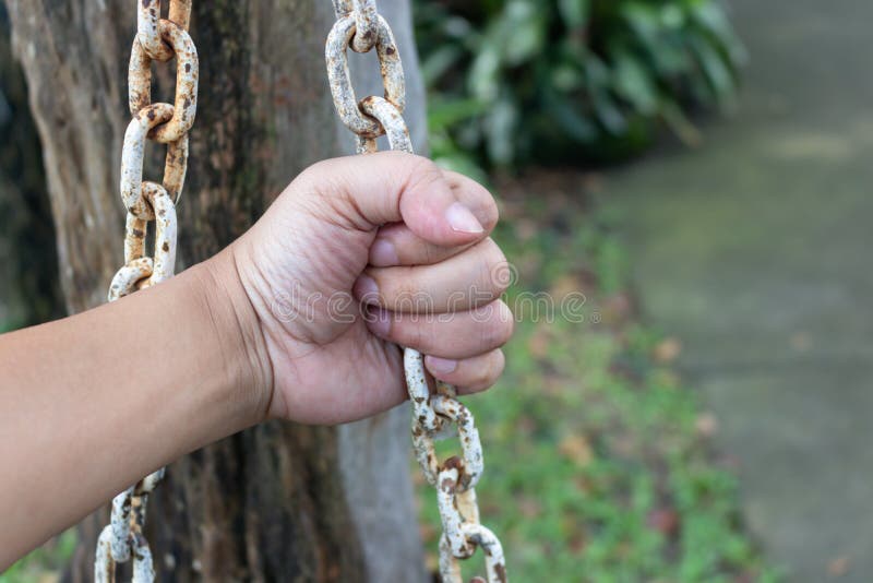 Man`s Hand is Holding on the Old Rust Chain Stock Photo - Image of ...