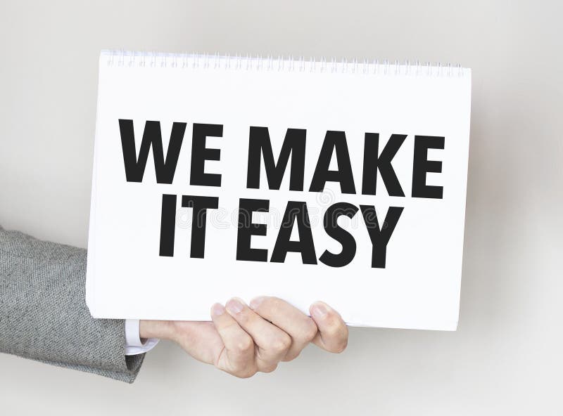 Man S Hand Holding Paper Sheet with we Make it Easy Words Stock Image ...