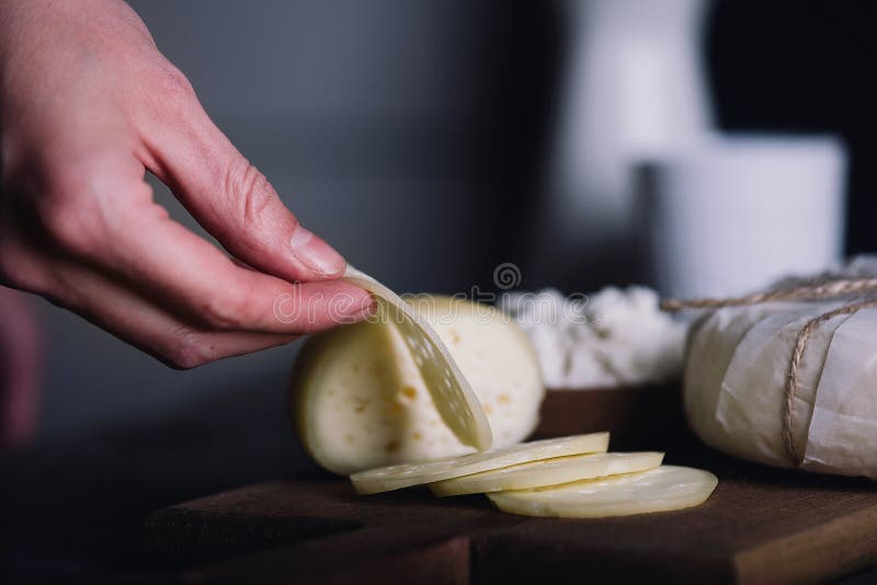 Man`s Hand Holding Piece of Cheese Stock Photo - Image of culinary ...