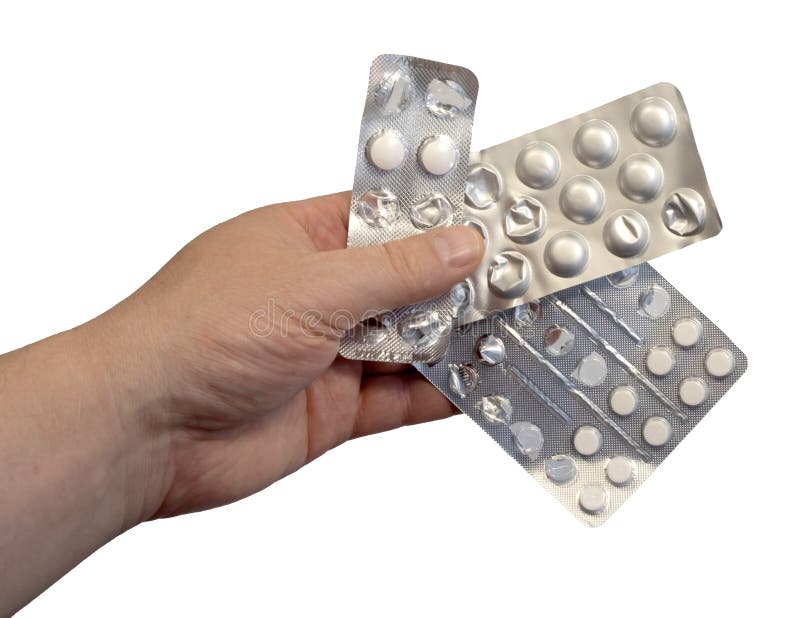 A Man& X27;s Hand Holding Pills in a Blister. There are Several Tablets ...