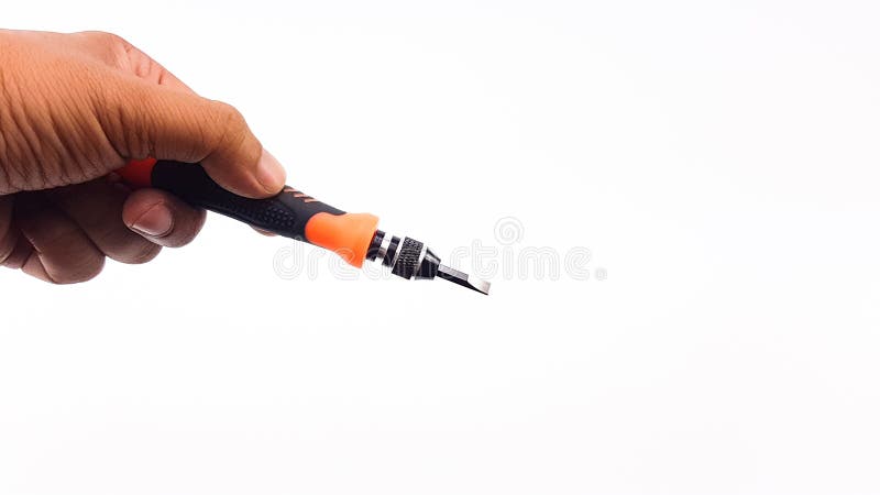Man& X27;s Hand Holding Driver with Orange Color Handle Stock Photo ...