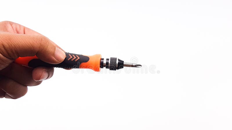 Man& X27;s Hand Holding Driver with Orange Color Handle Stock Photo ...