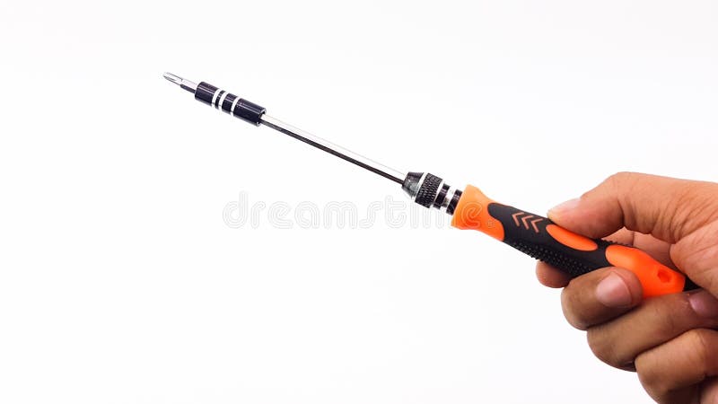 Man& X27;s Hand Holding Driver with Orange Color Handle Stock Image ...