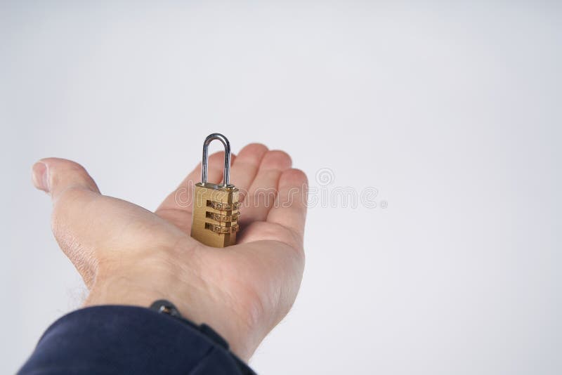 Man`s Hand Holding Small Combination Lock Stock Photo - Image of ...