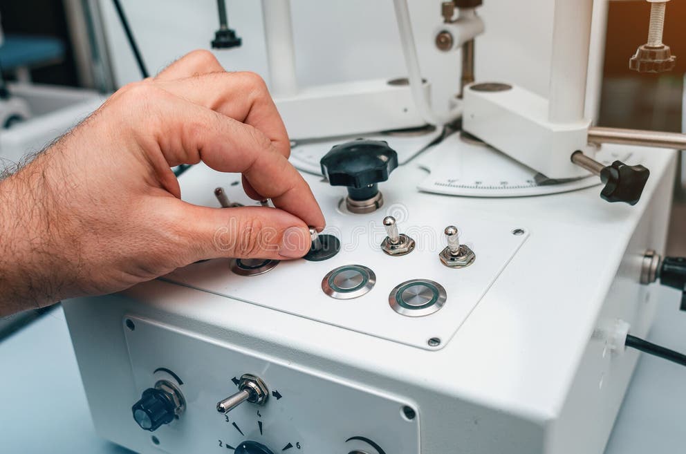 Man S Hand Holds the Handle of the Device. Modern Ophthalmological ...