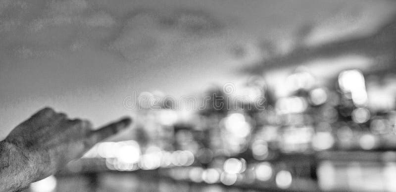 Man S Hand Indicating Modern City Skyline at Night Stock Photo - Image ...