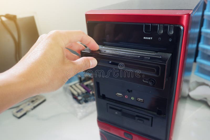 Man S Hand Inserting CD-ROM into Computer Case Stock Image - Image of ...