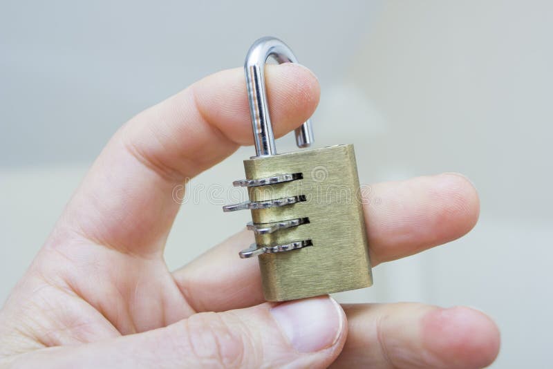 Man s hand with a lock stock photo. Image of metal, loan - 54201628