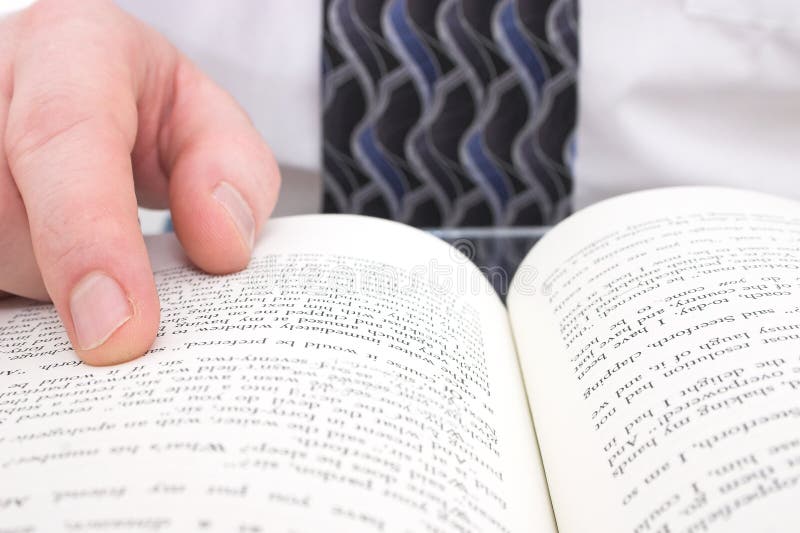 Man s Hand on Open Book stock image. Image of hand, point - 117191