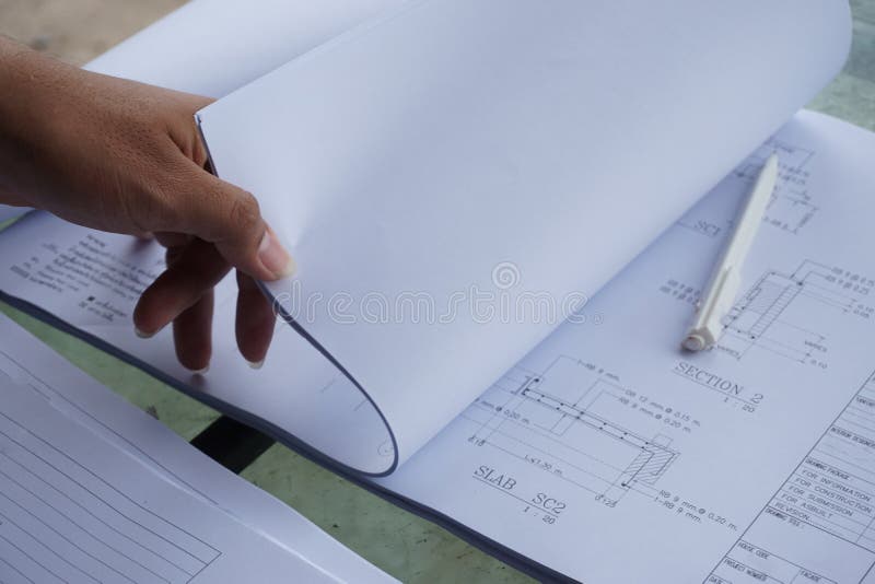 A Man`s Hand Opening a Large White Paper. Stock Photo - Image of ...