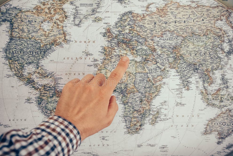 A Man`s Hand is Pointing at the Map, Close-up Stock Photo - Image of ...