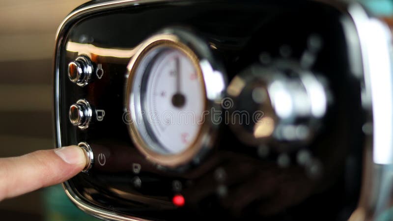 Man`s Hand Pressing the Power Button of the Coffee Machine. Stock Image ...