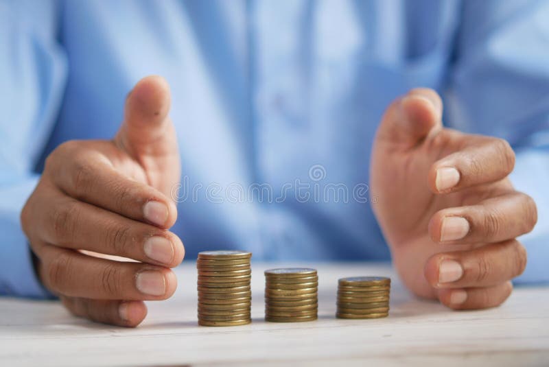 Man& X27;s Hand Putting Stack of Coins Stock Photo - Image of growth ...