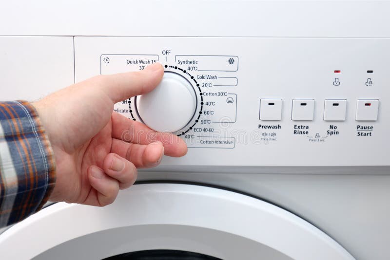 A Man S Hand Sets the Automatic Washing Program Switch on the Washing ...