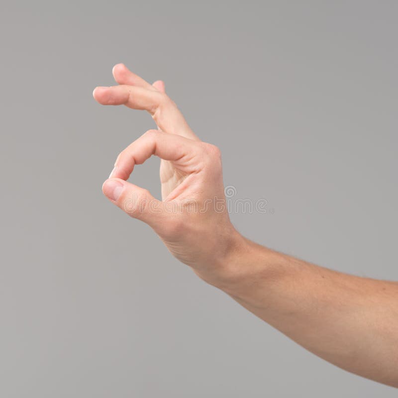 Man`s hand showing OK stock photo. Image of gesturing - 127895326
