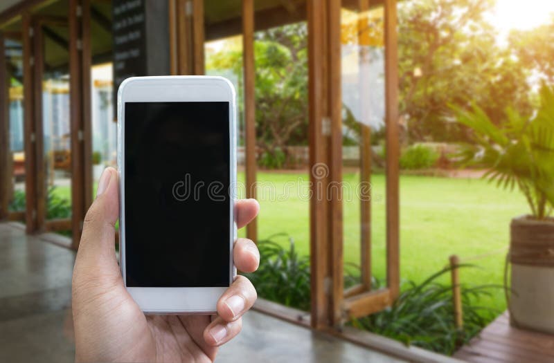 Man's Hand Shows White Smartphone Vertical Position Stock Photos - Free ...