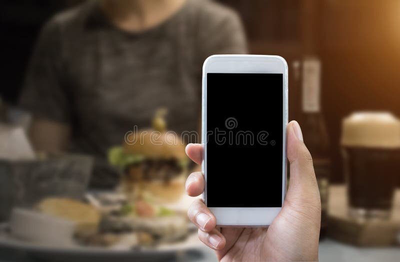 Man`s Hand Shows Mobile Smartphone in Vertical Position Stock Photo ...