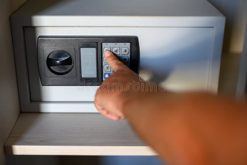 Man S Hand Types in the Combination of a Small Safe Stock Photo - Image ...