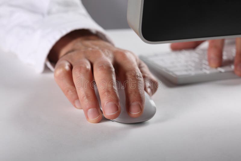 Man`s Hand Using a Computer Mouse and a Keyboard Stock Photo - Image of ...