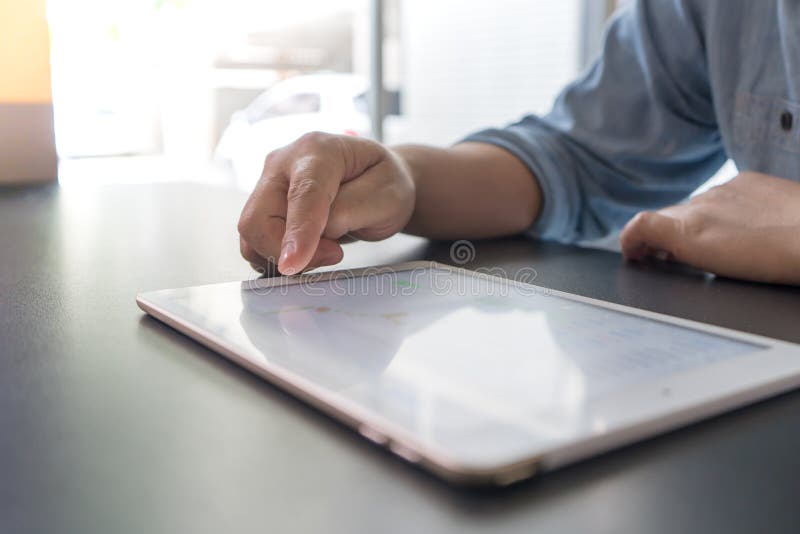 Closeup of Man`s Hand Using Digital Tablet for Checking Stock Image ...